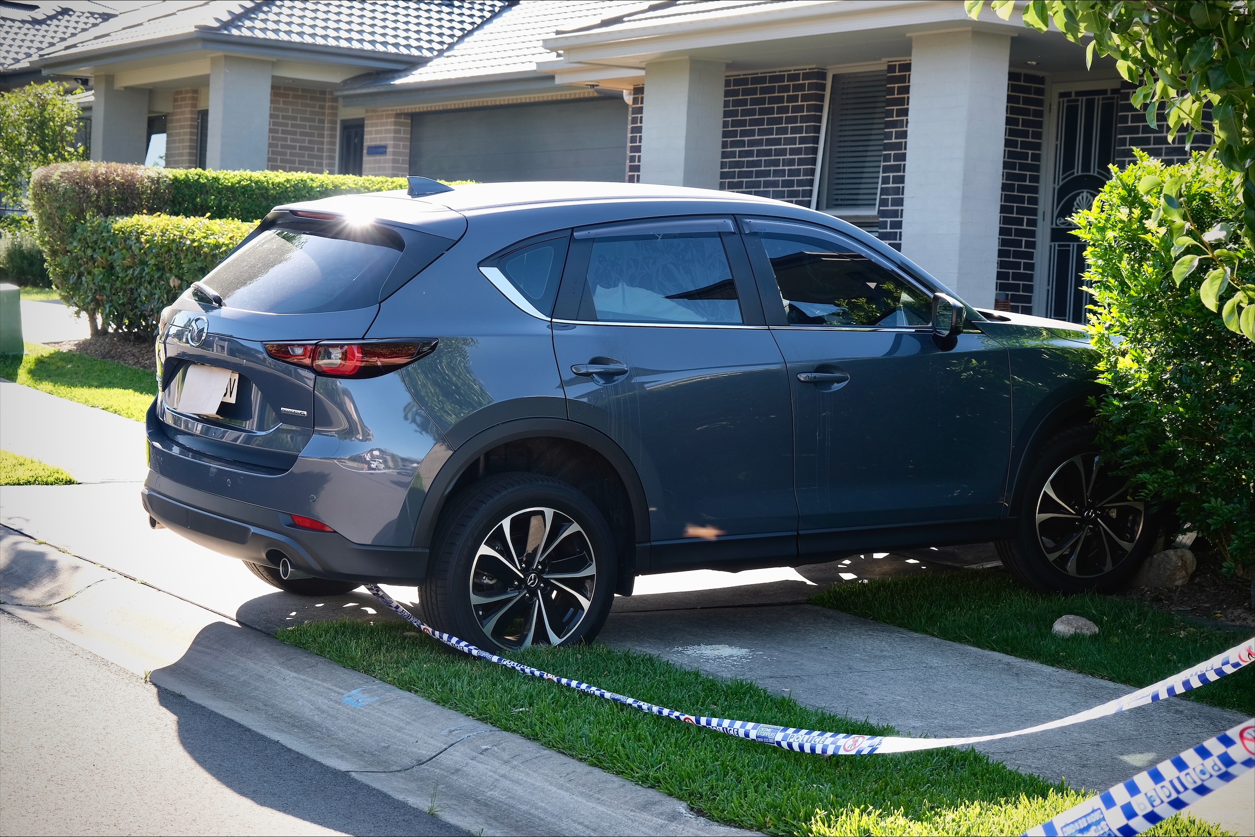 Live grenade, firearms, sledgehammer seized by police after Sydney ...