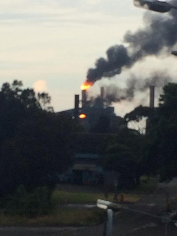 Port Kembla smoke stack collapses at BlueScope Steel; blaze contained ...