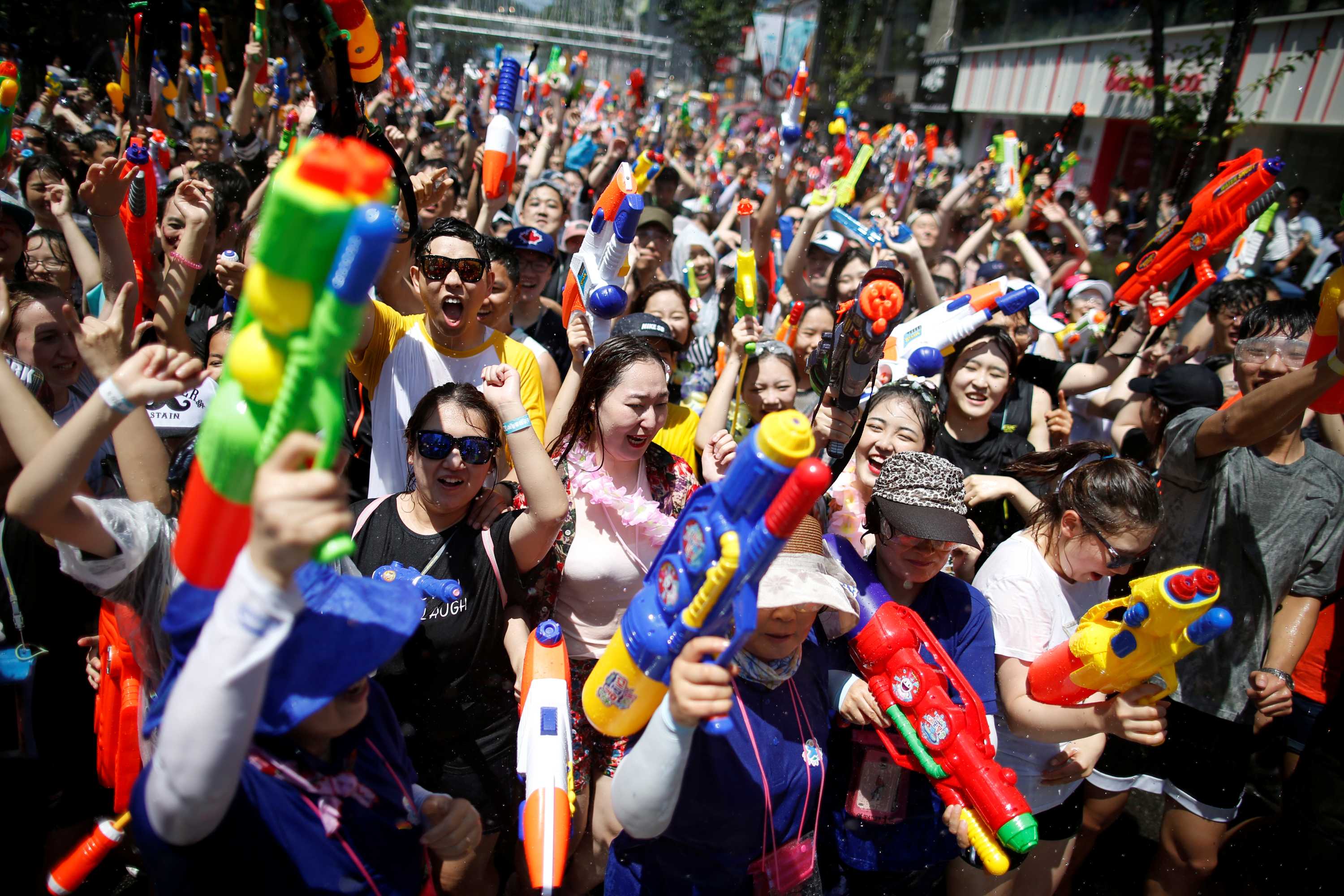 South Korea: Participants fight off summer heat in massive water gun ...