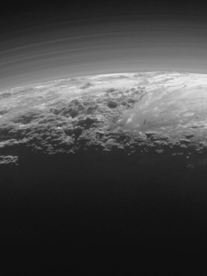 New images of Pluto taken by New Horizons probe reveal water and blue ...