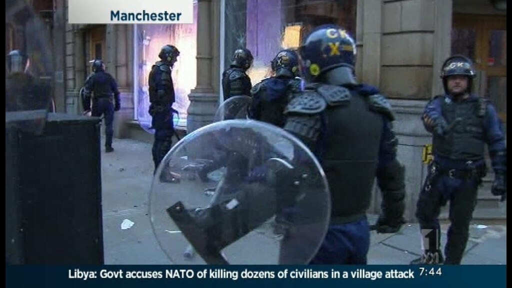 Youths rampage in Manchester as riots spread north - ABC News