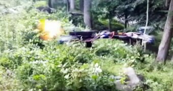 A video showing a gun attached to a drone, posted to YouTube by Austin ...