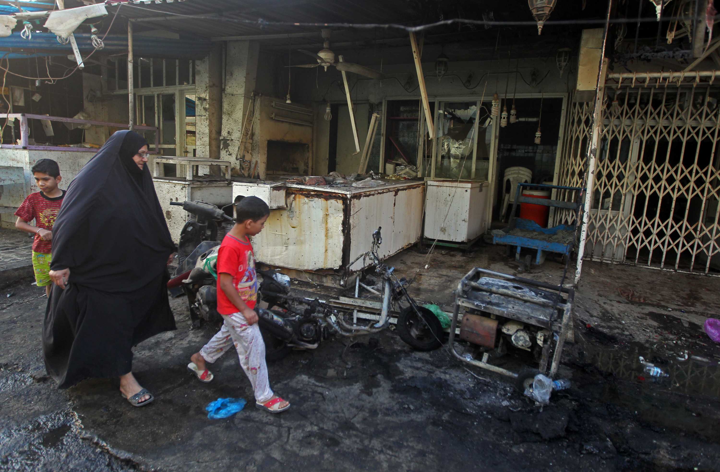 Suicide bomber kills 26 people at a funeral in the Iraqi town of ...