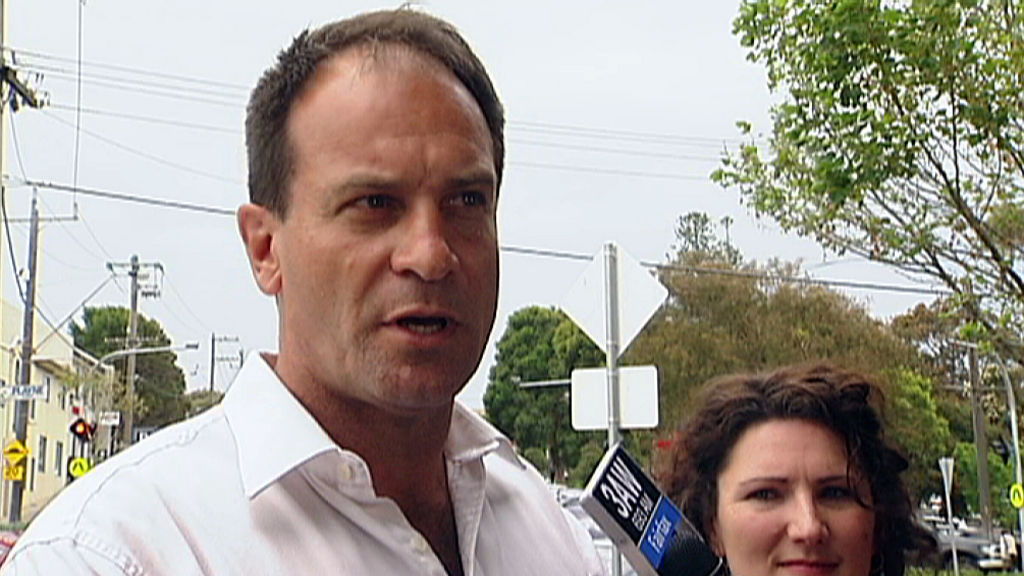 Geoff Shaw speaks to journalists outside his Frankston office - ABC News
