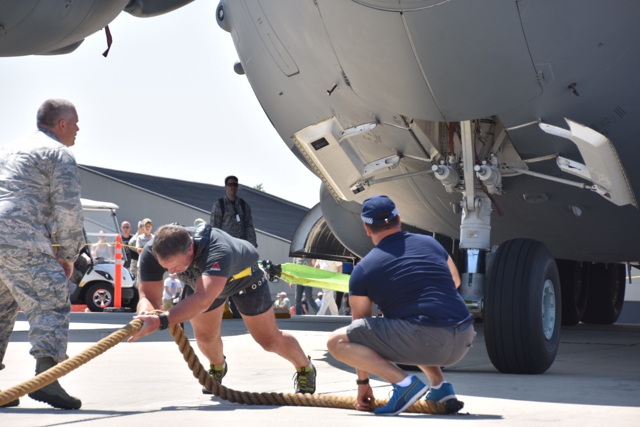 AFP commander and Australian strongman Grant Edwards pulls 190-tonne C ...