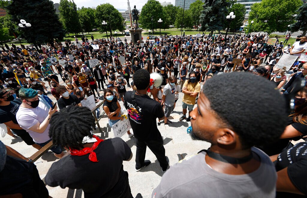 US protests latest: Denver police ordered to stop deploying 'less-than ...
