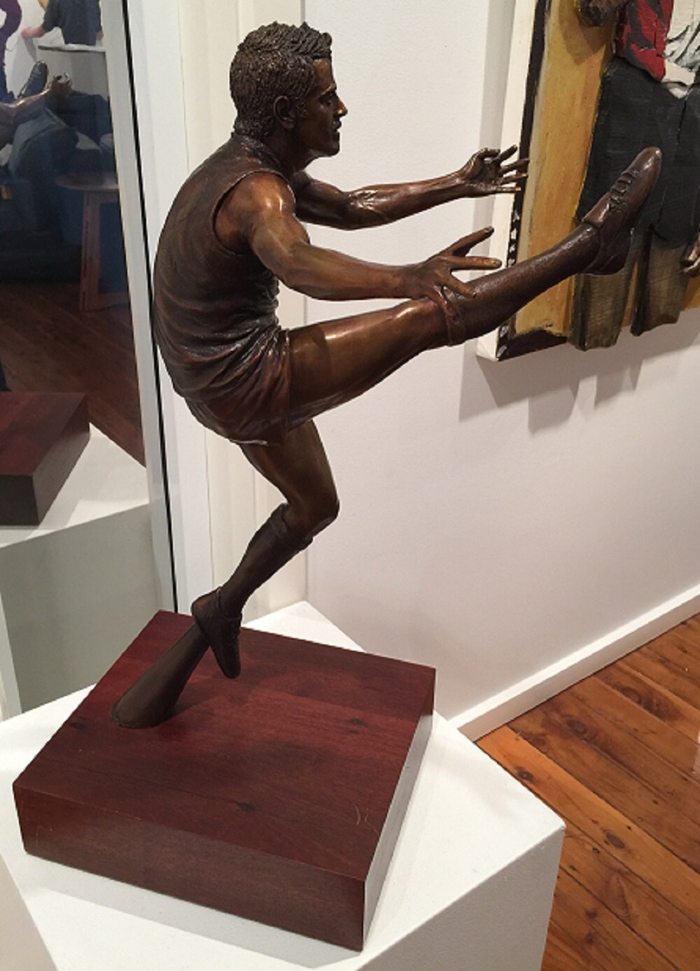 AFL superstars and grassroots football feature in art exhibition - ABC News