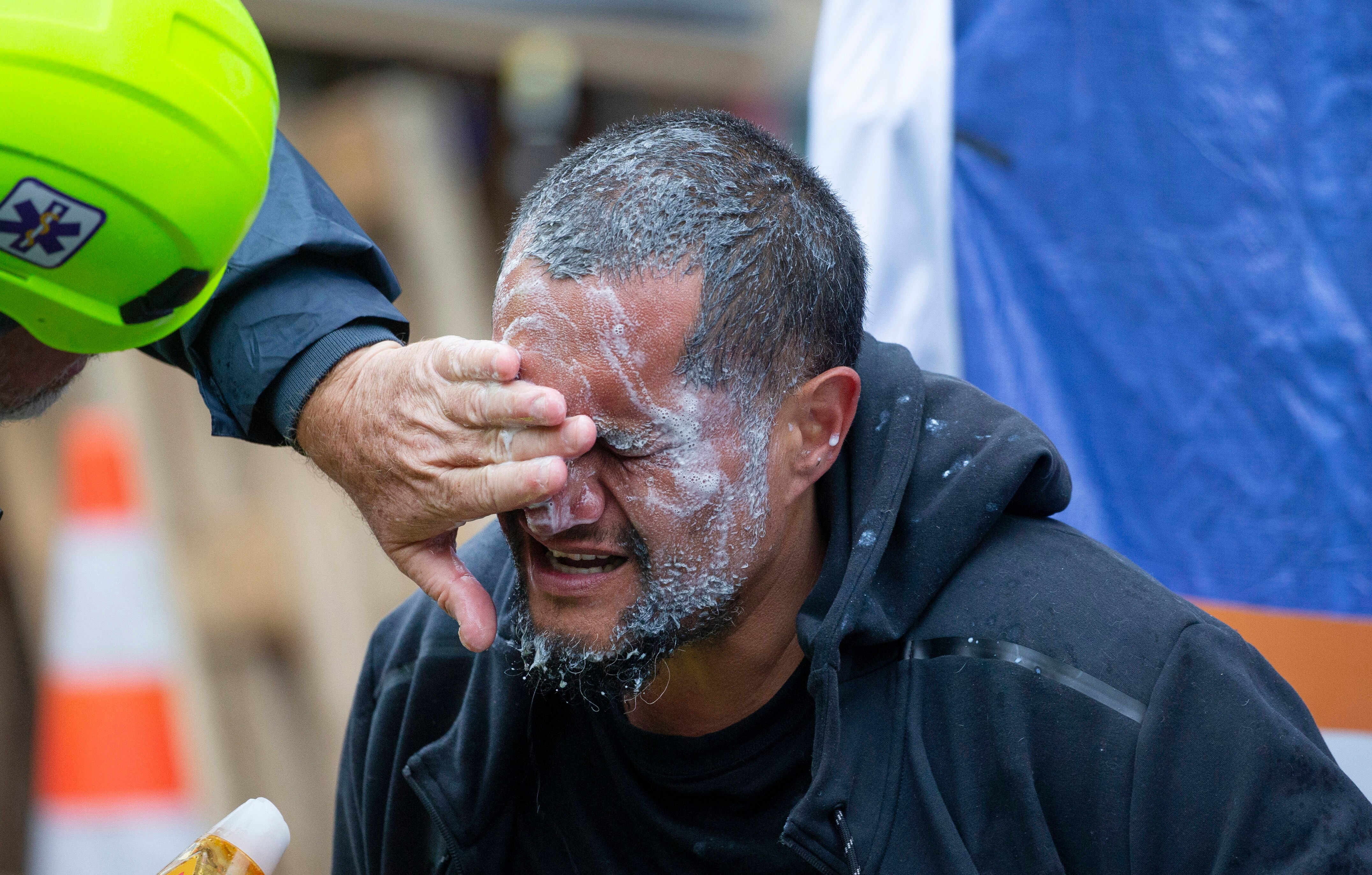 Wellington protesters against COVID vaccine mandates set fires as NZ ...