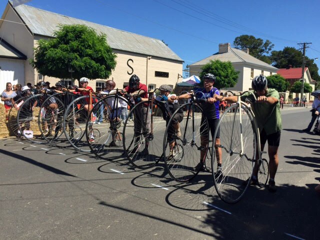 Penny farthing while playing classical guitar helping prepare for ...