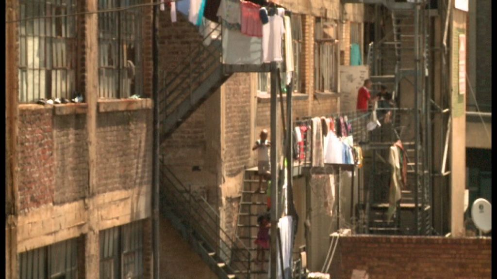 Reclaiming hijacked buildings in central Johannesburg - ABC News