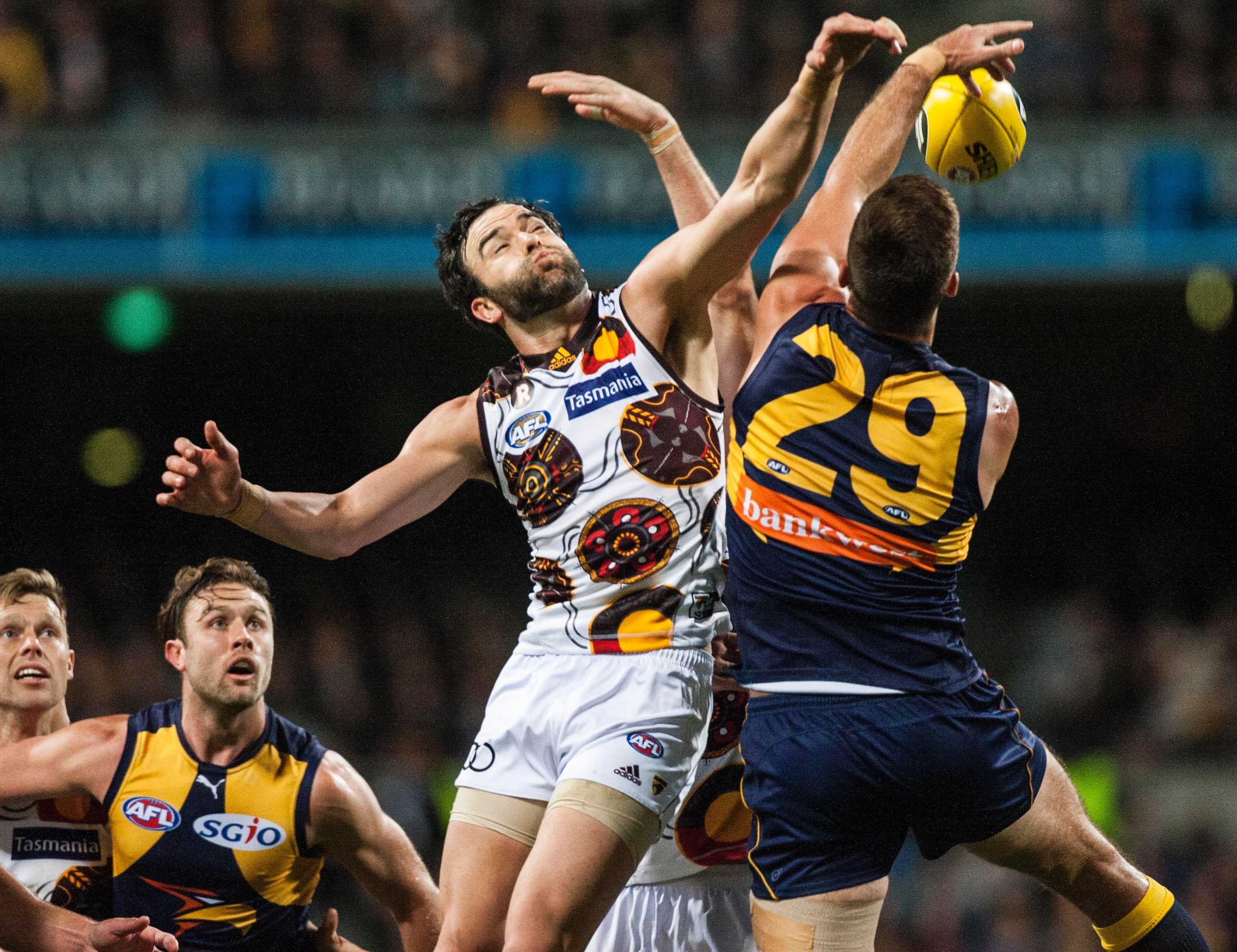 AFL bans third man up at ruck contests, players voice displeasure at ...