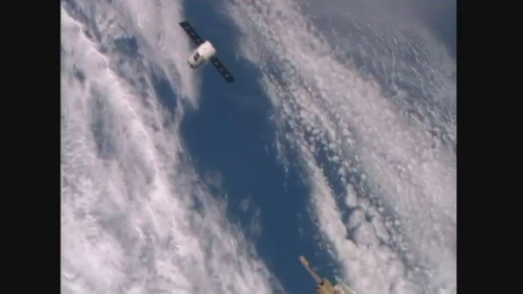 NASA footage shows moment the dragon connects with space station - ABC News