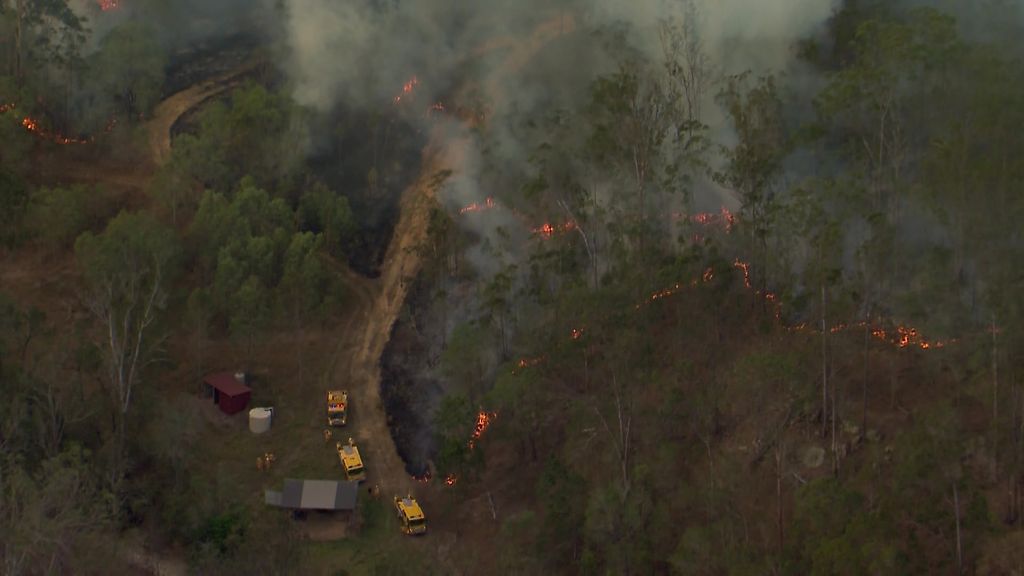 Firefighters on the ground at fires in Undullah. - ABC News