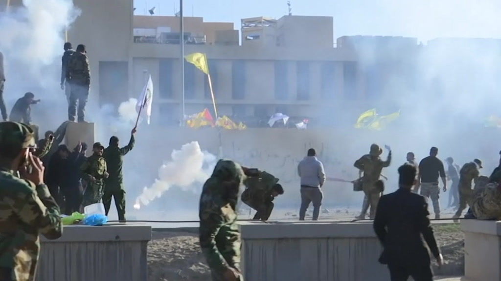 Outraged Iraqi protesters stormed the U.S. Embassy compound in Baghdad ...