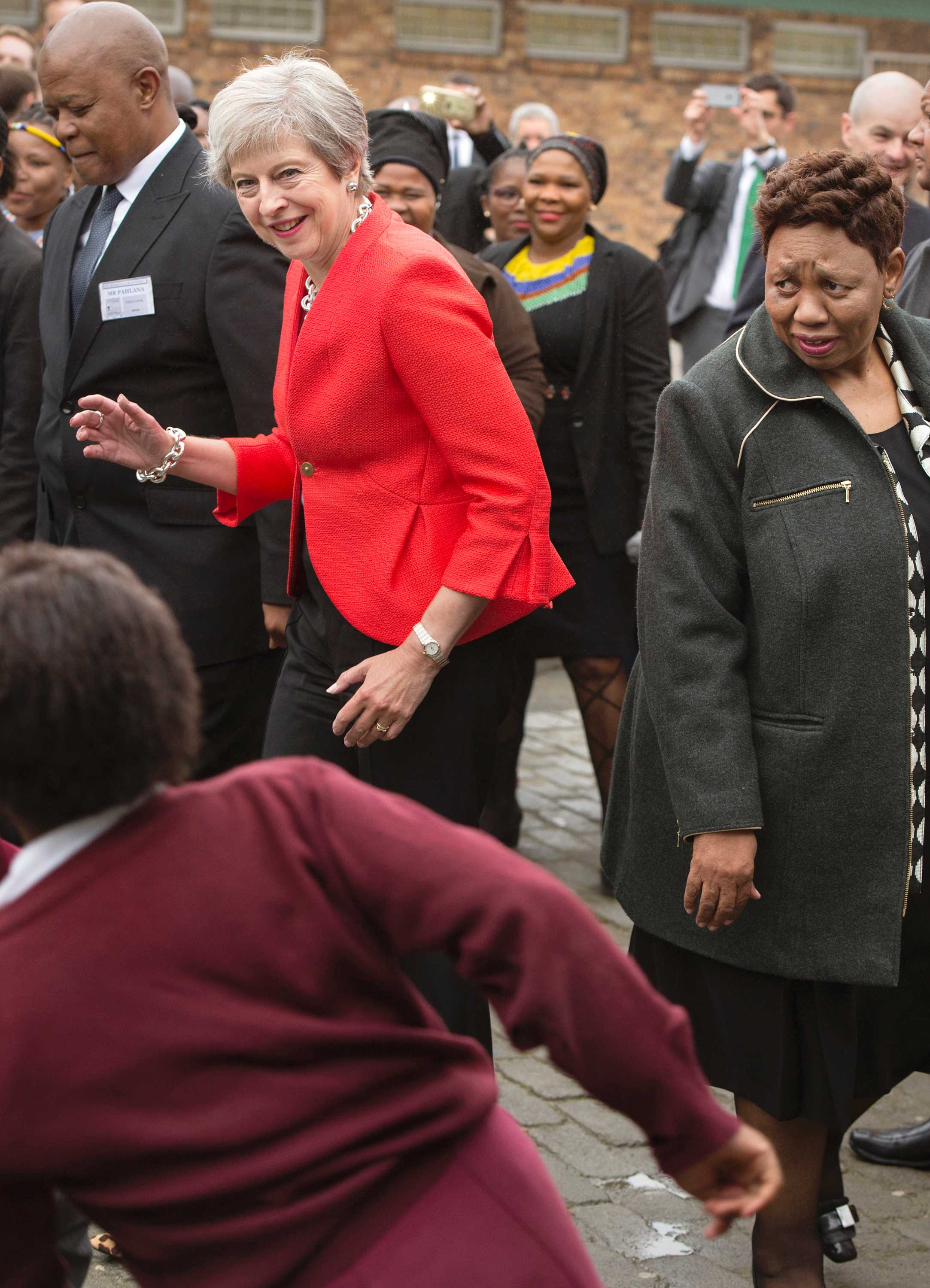 Theresa May shows off her 'Maybot' dance moves during South Africa ...