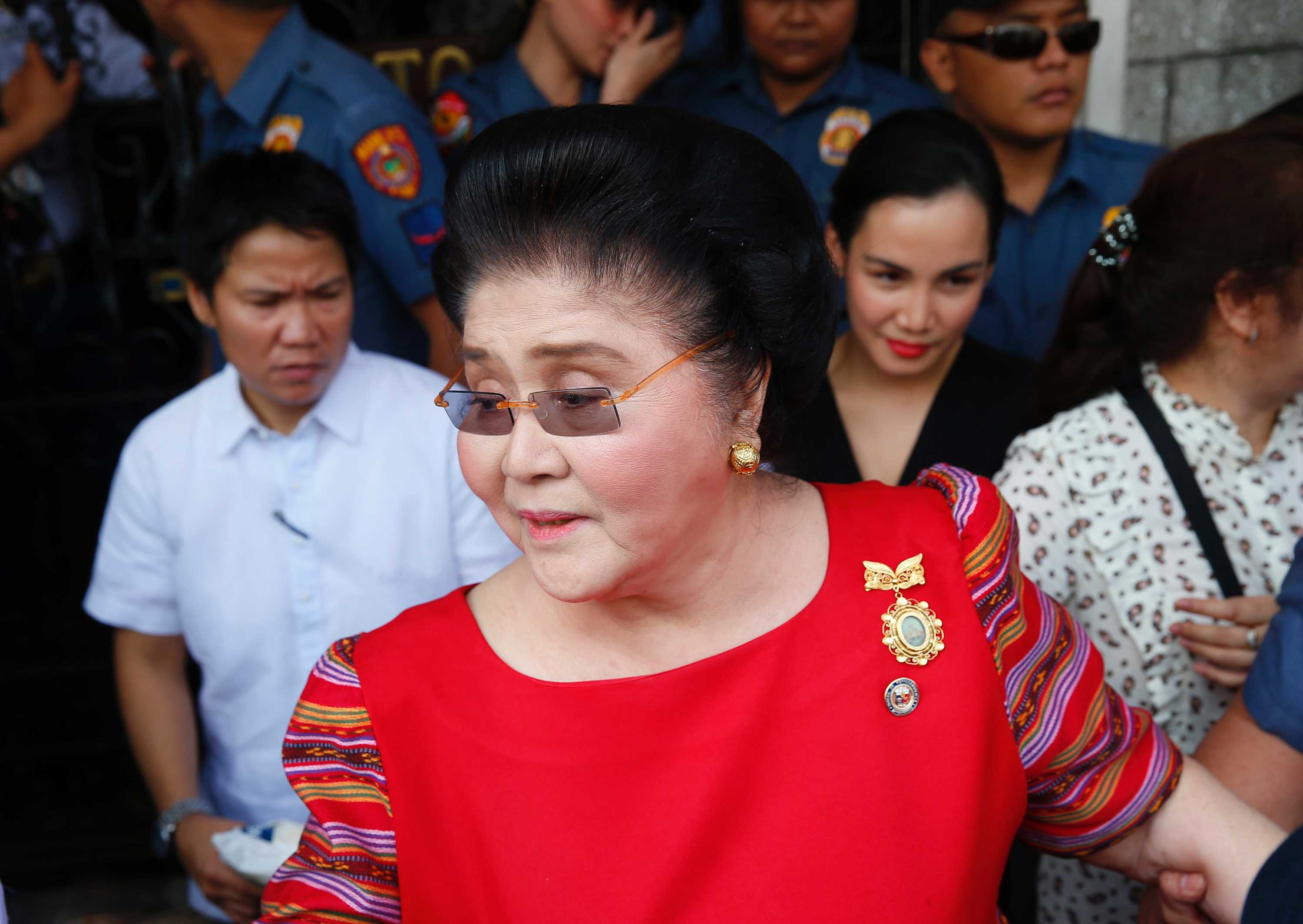 Imelda Marcos: Court convicts former Philippines first lady of ...