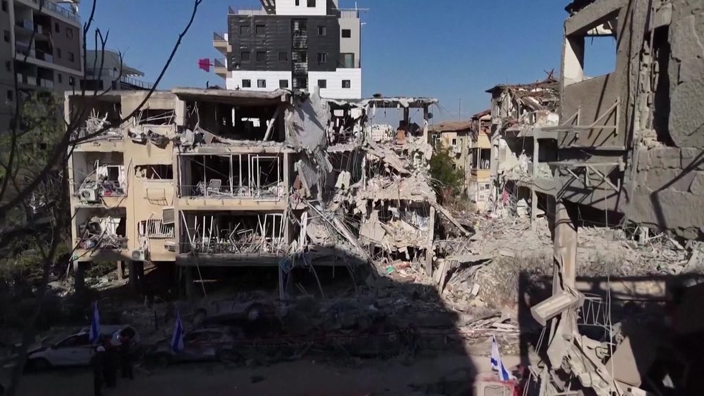 Drone flies through aftermath of Iranian missile strike on apartment ...