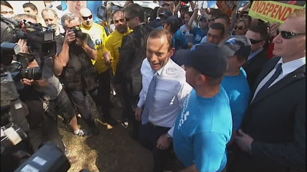 Protesters confront Tony Abbott during visit to Sydney polling booth ...
