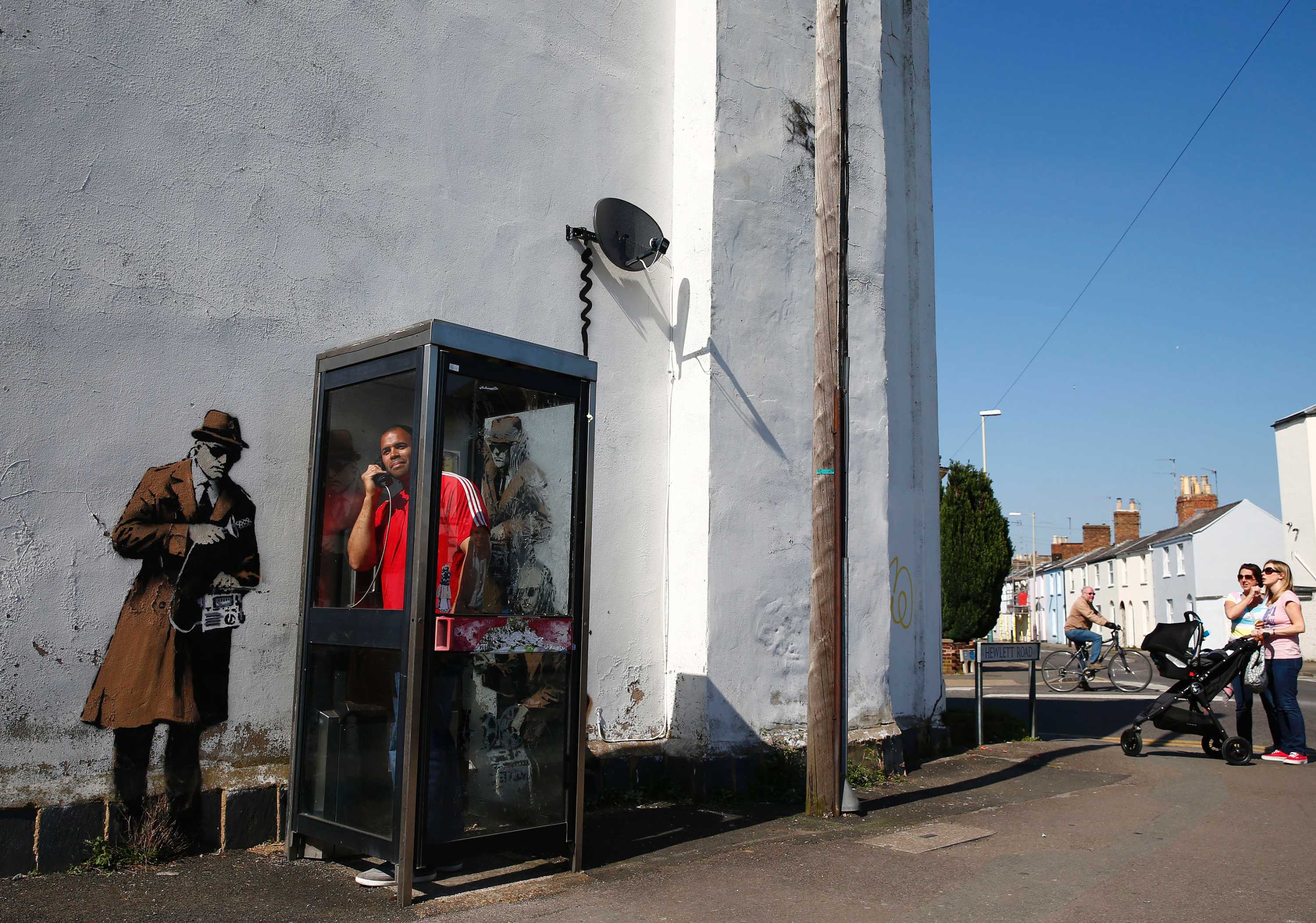 Graffiti artist Banksy's Spy Booth mural defaced with spray paint - ABC ...