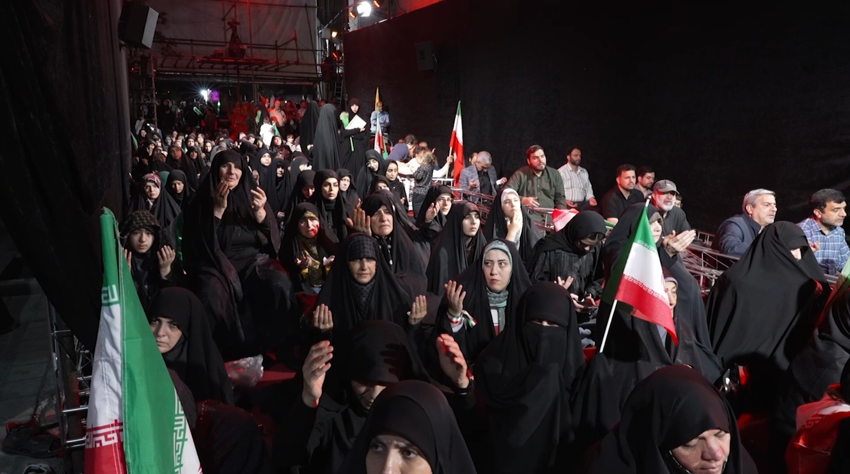 Women at a memorial for Ali Khamenei - ABC News