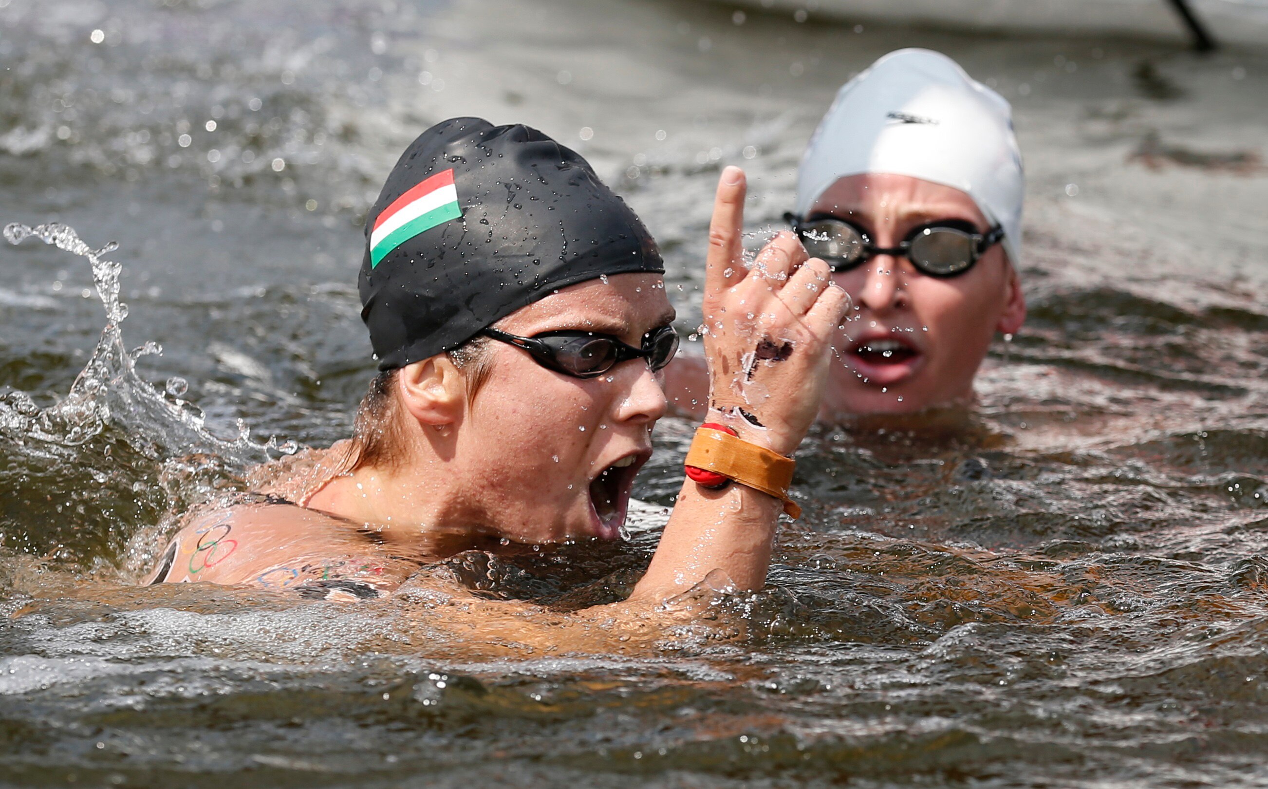 Risztov wins women's marathon swim - ABC News