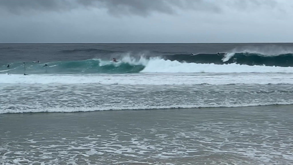 Surfers take on huge swell at Snapper Rocks on Queensland's southern ...