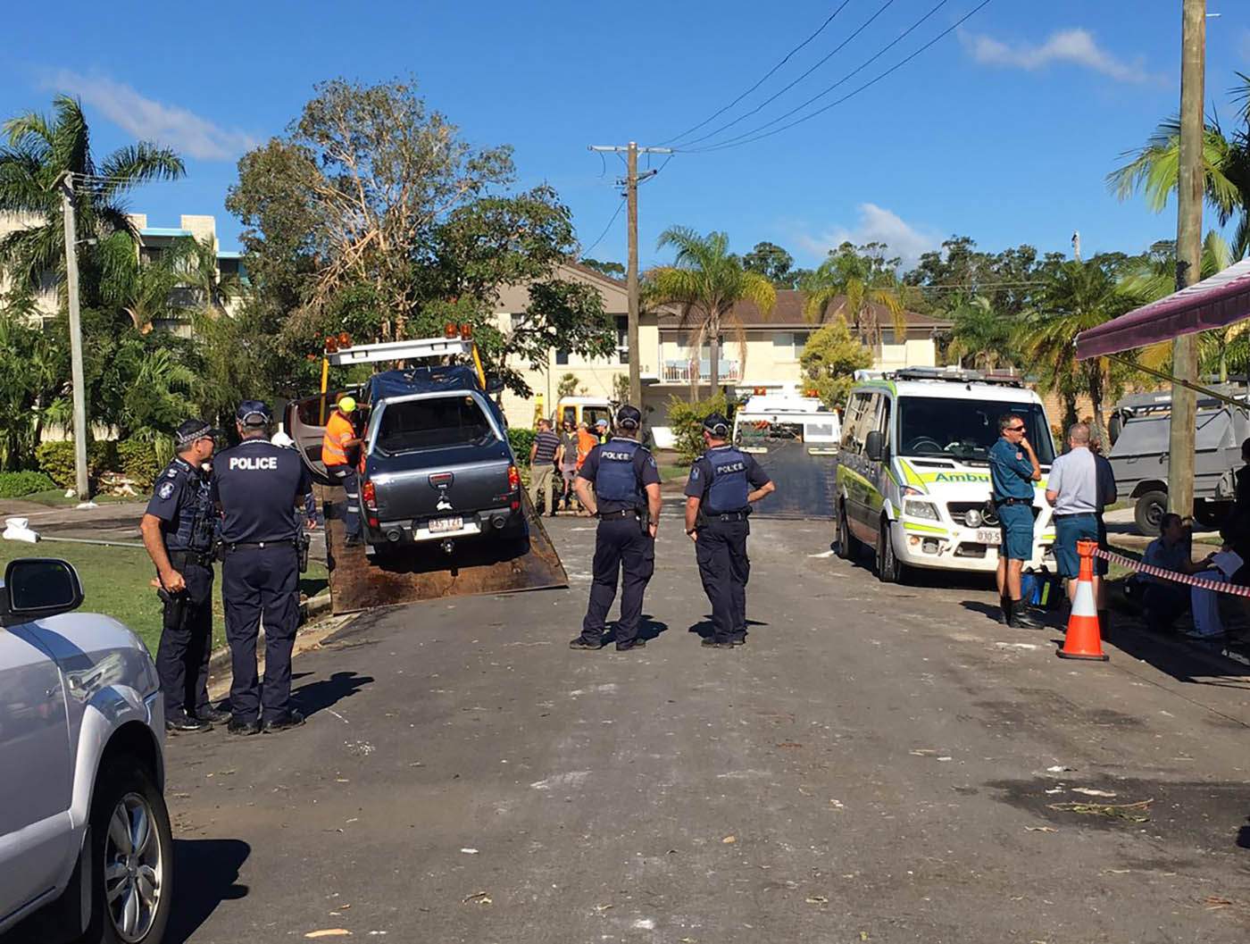 Strong winds tear roofs from unit blocks, trashing cars in Mooloolaba ...