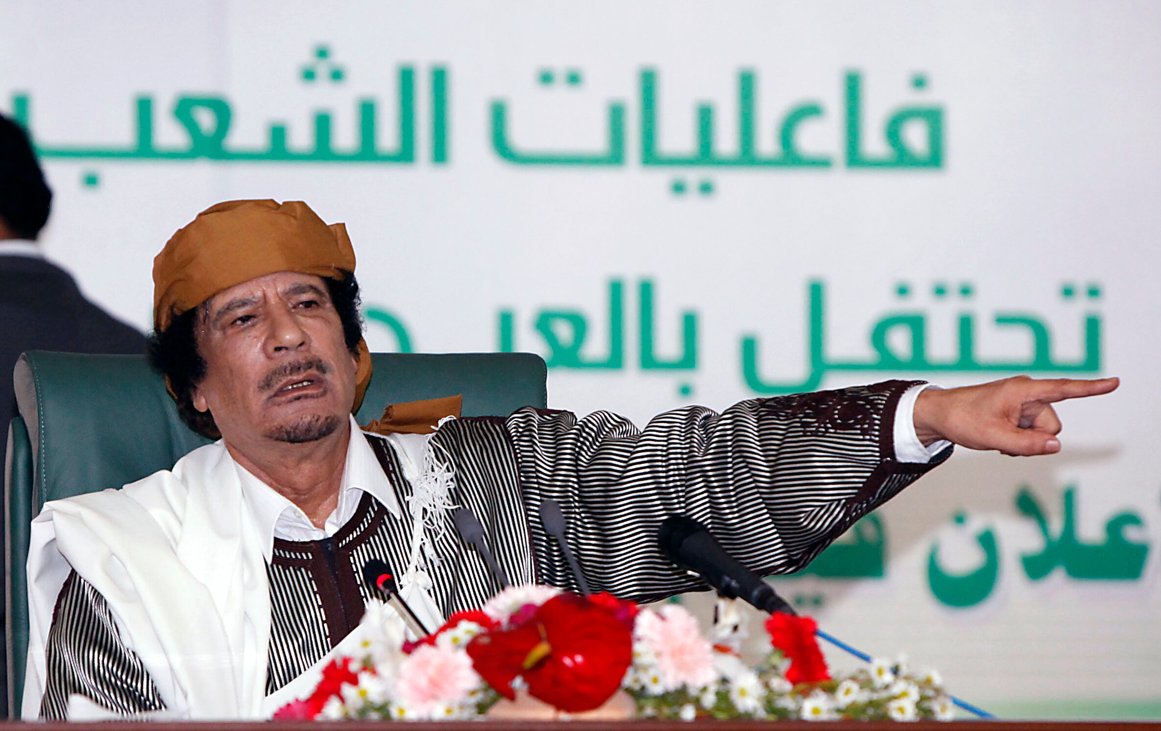 Gaddafi dragged from drain and shot in the head - ABC News