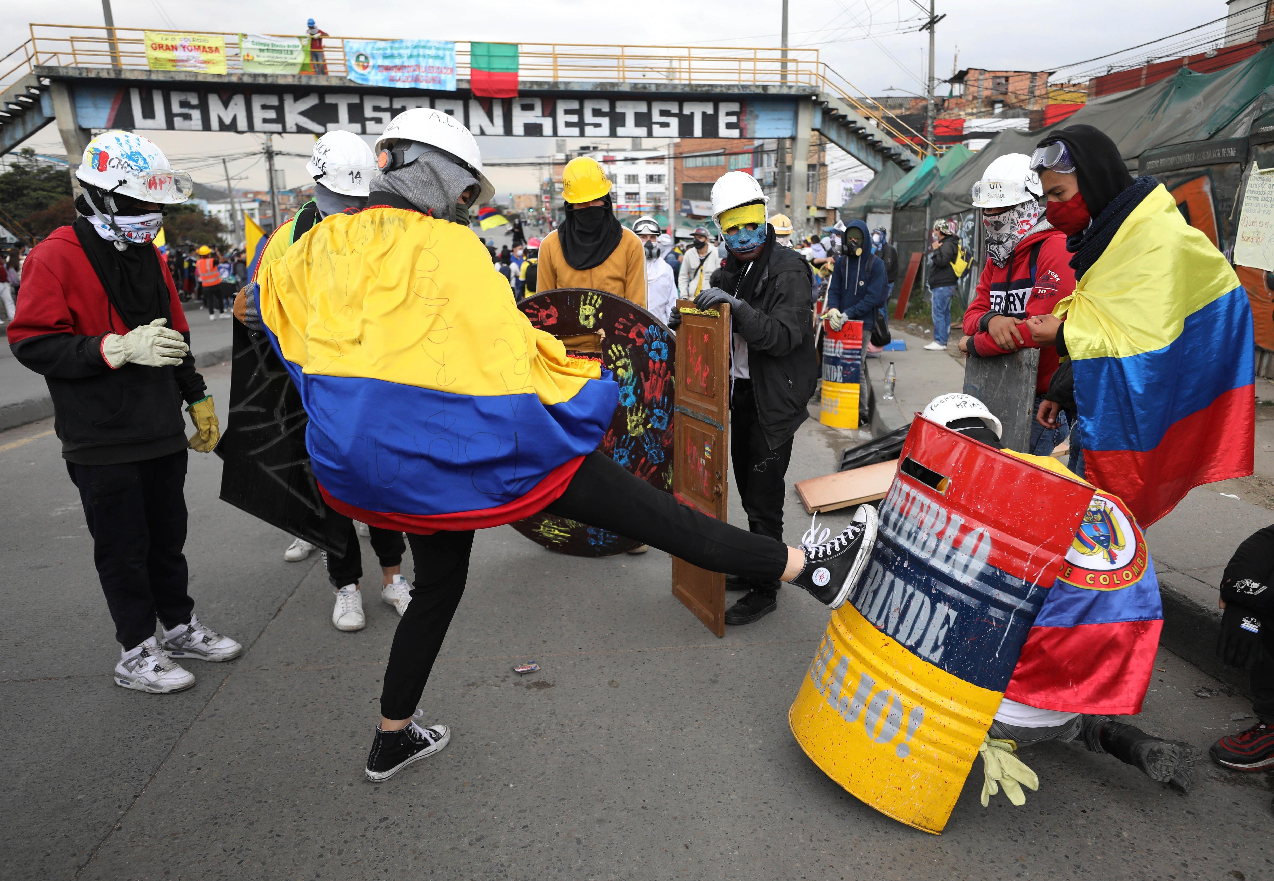 Colombia protests against government leave 13 dead in Cali, marking a ...