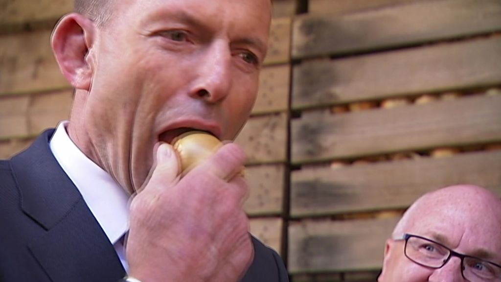 Tony Abbott eats an onion - ABC News