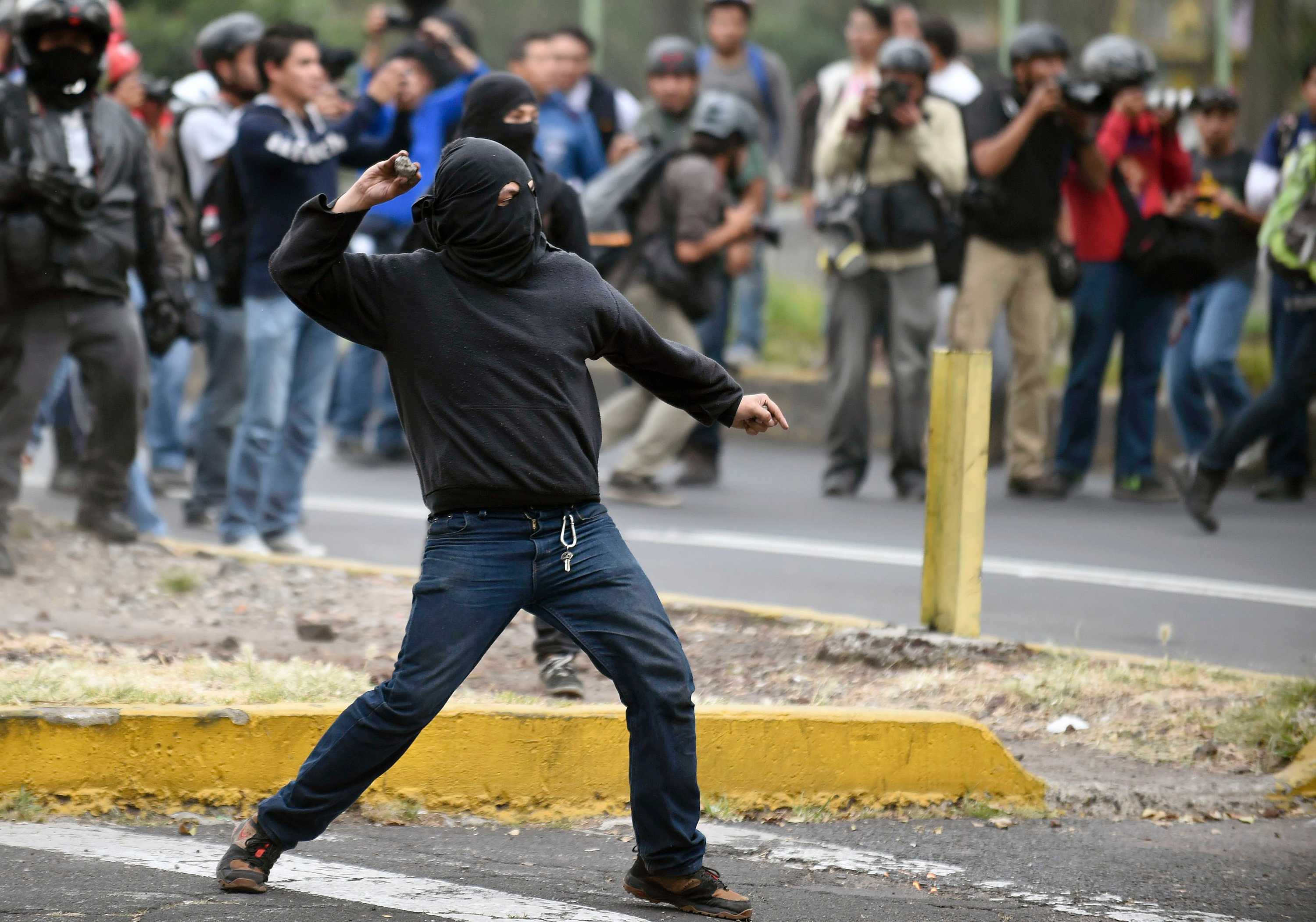 Riot police face protesters in Mexico City as anger grows over ...