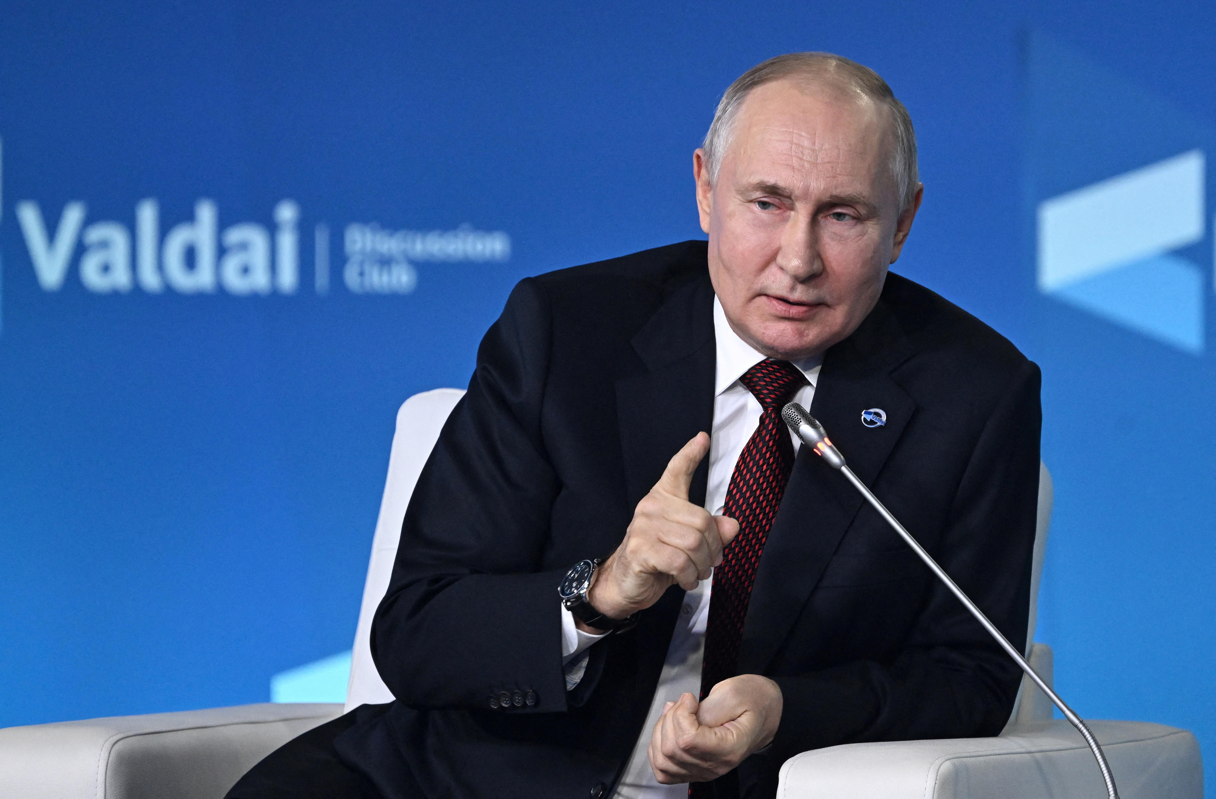 Putin says hand grenade fragments found in bodies from plane crash that ...