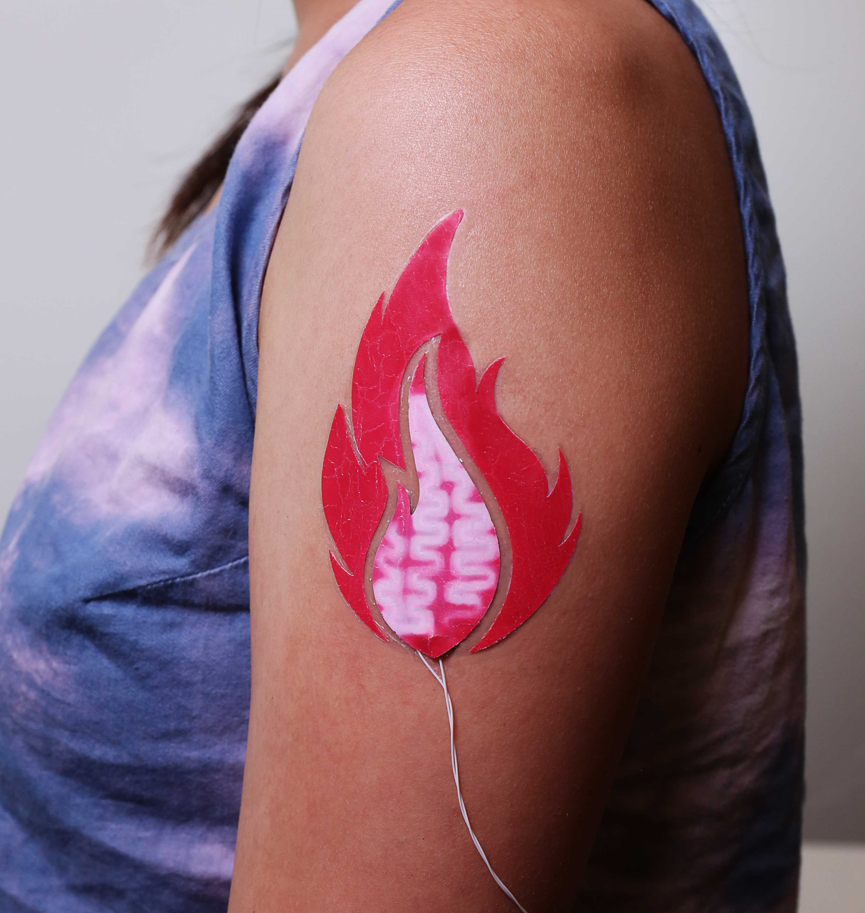 Tattoos get smart, interfacing with devices and changing colour to ...