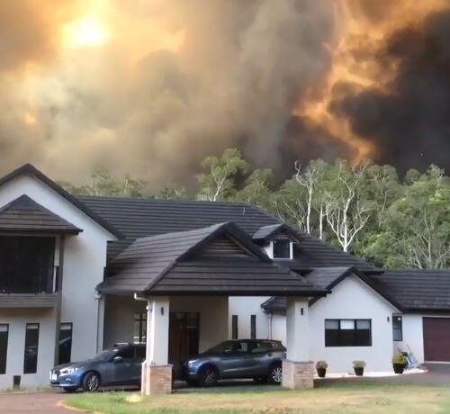 Coolum bushfire: Threat eases, fire contained - ABC News
