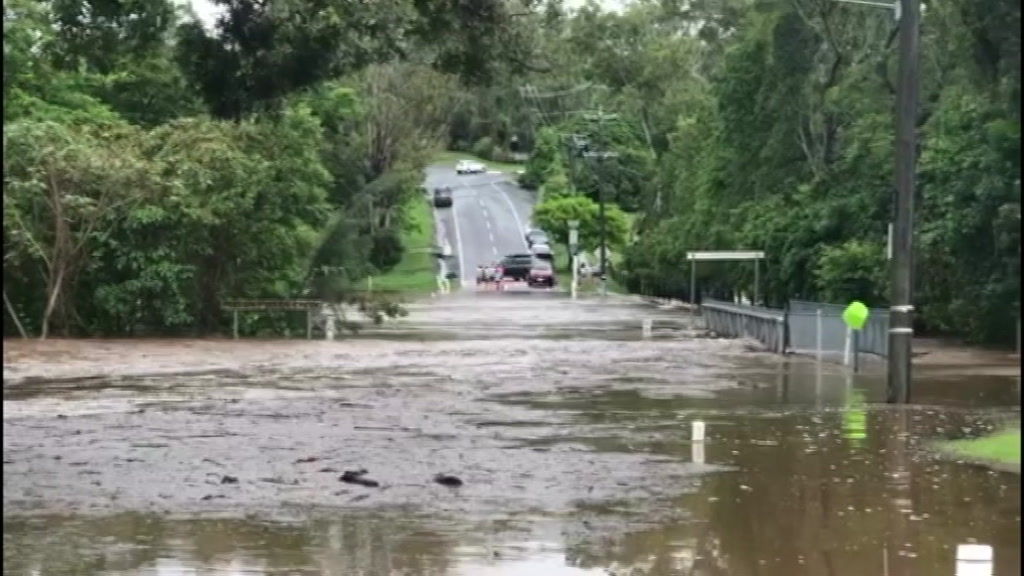 Flash flooding has hit parts of Brisbane with creeks overflowing in ...