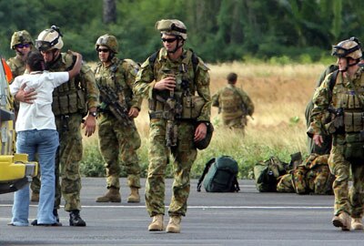 Troops pour into Dili - ABC News