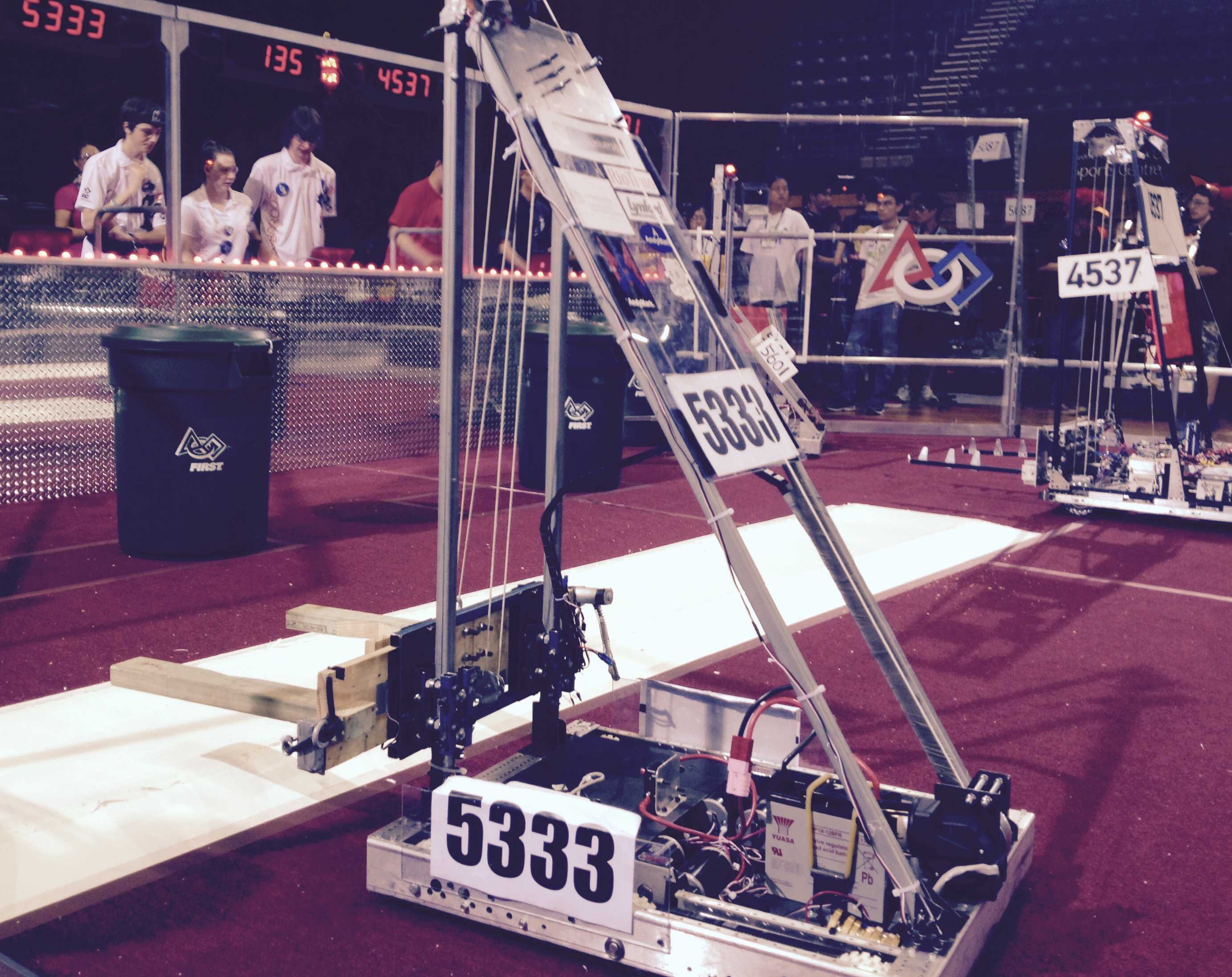 High school students design and build robots for FIRST Robotics ...