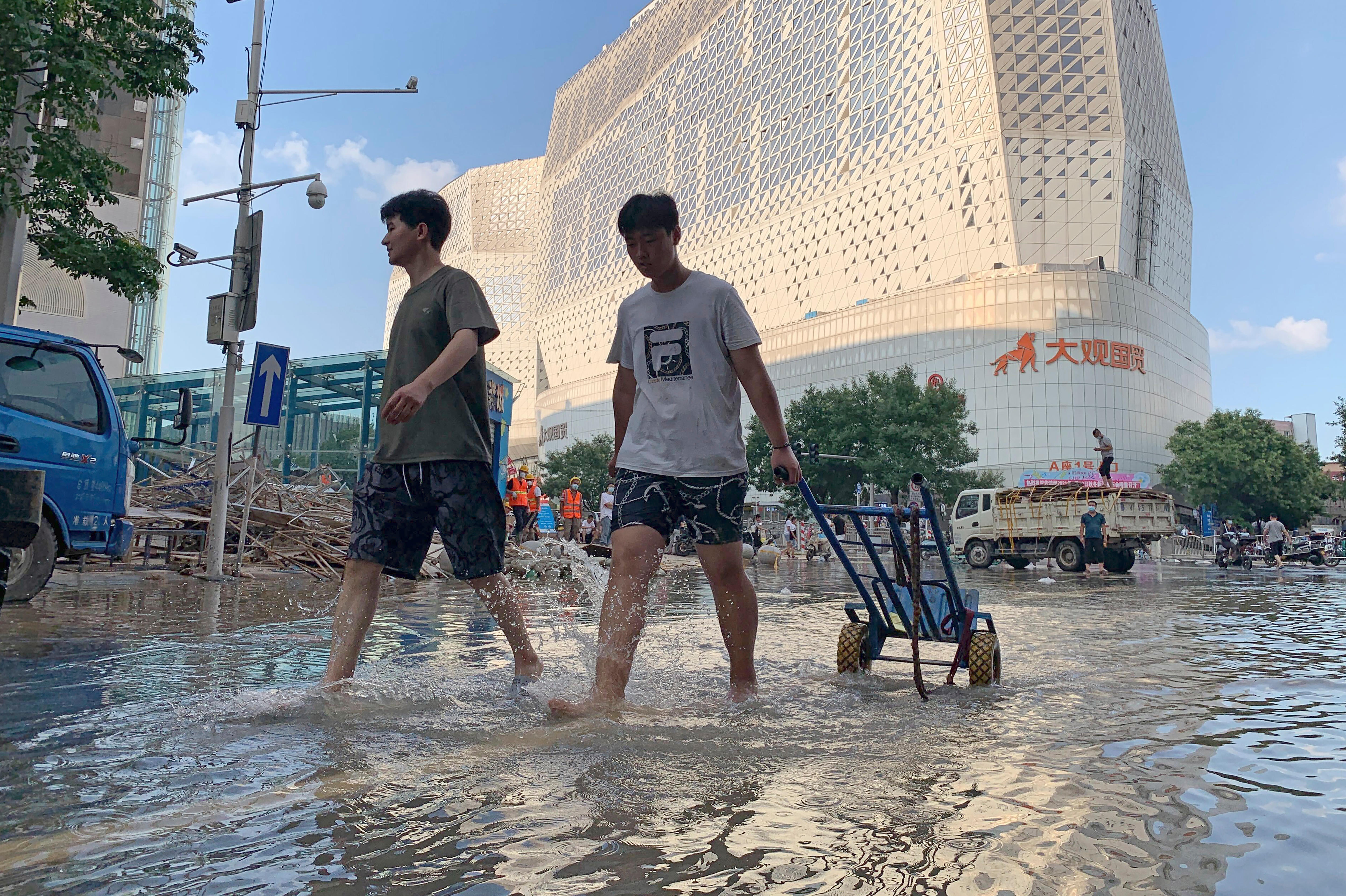 Death toll from floods in Zhengzhou, China more than triples, says ...