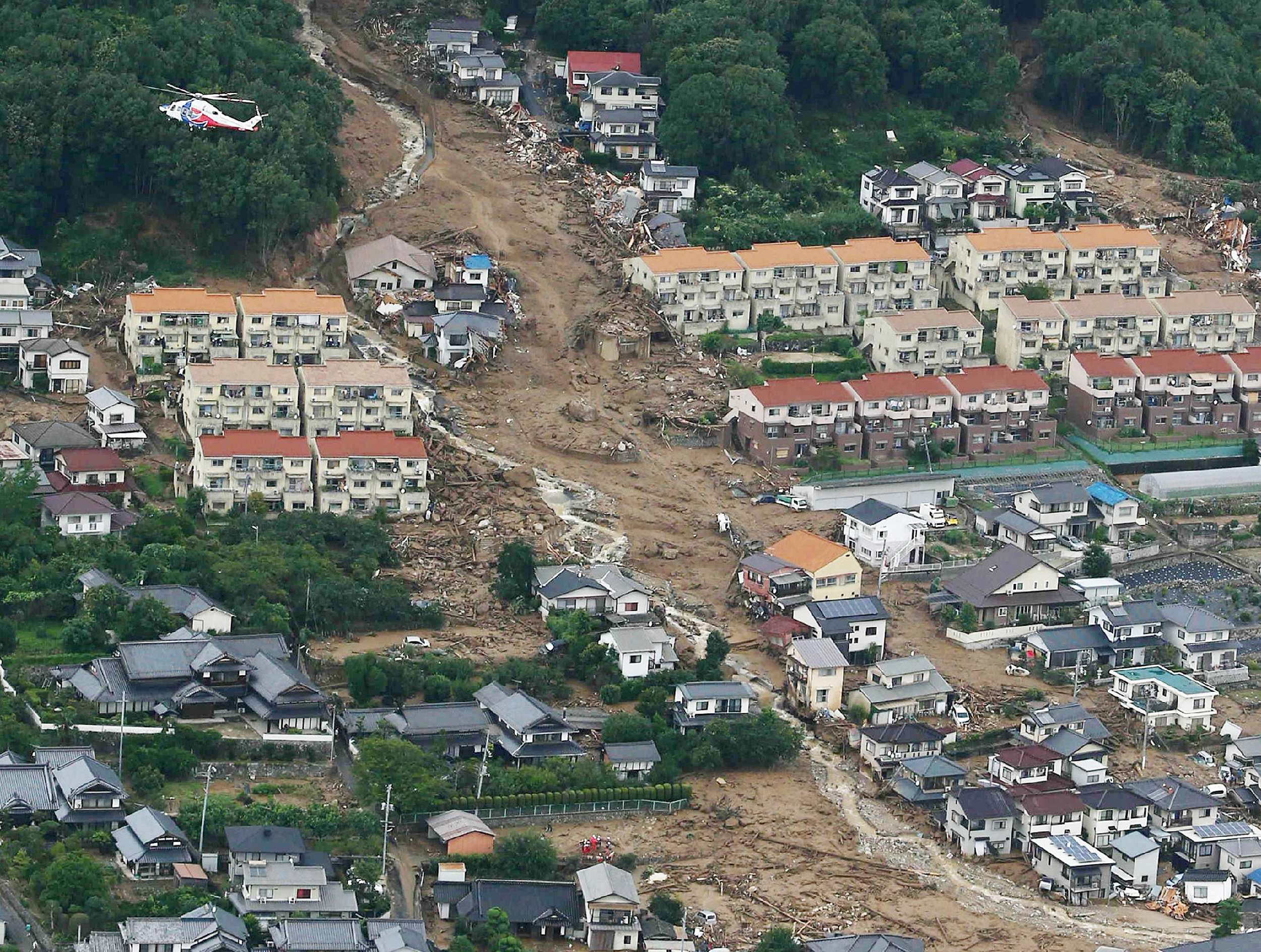 Japan landslide: At least 39 people dead, more missing as homes are ...
