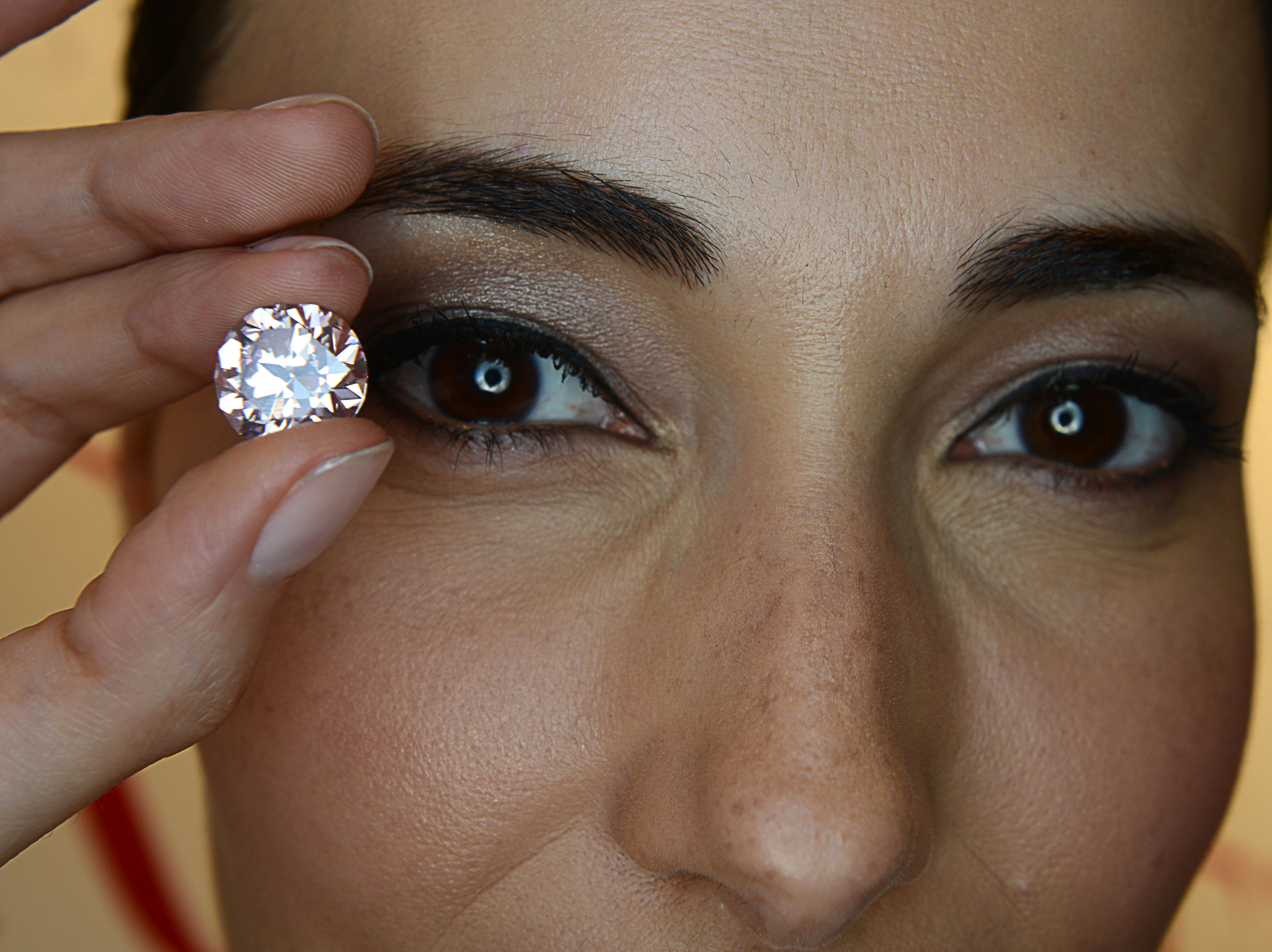 Rare pink diamond sells for $17m - ABC News