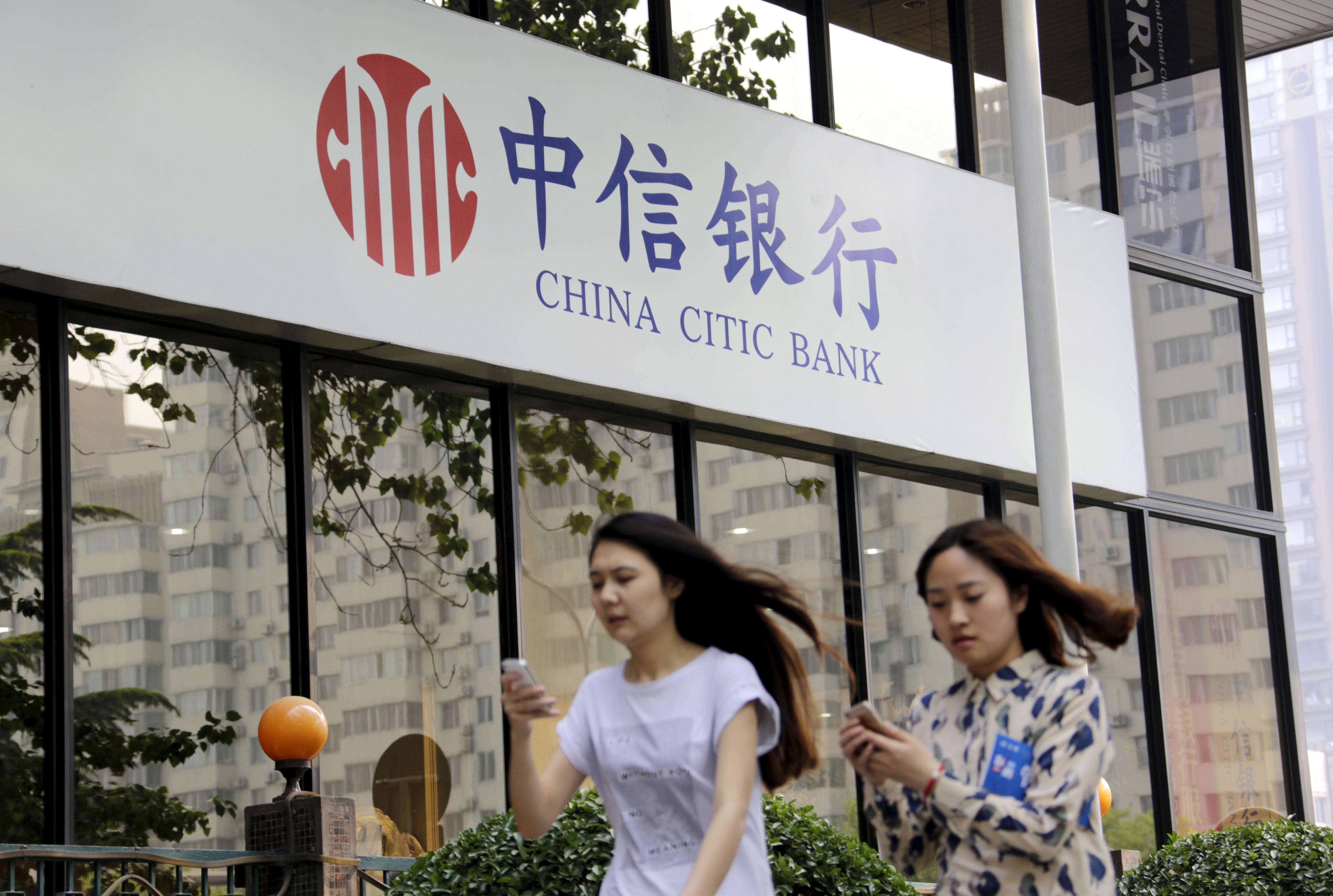 Victims of bank Ponzi-like scheme in China unable to withdraw money ...