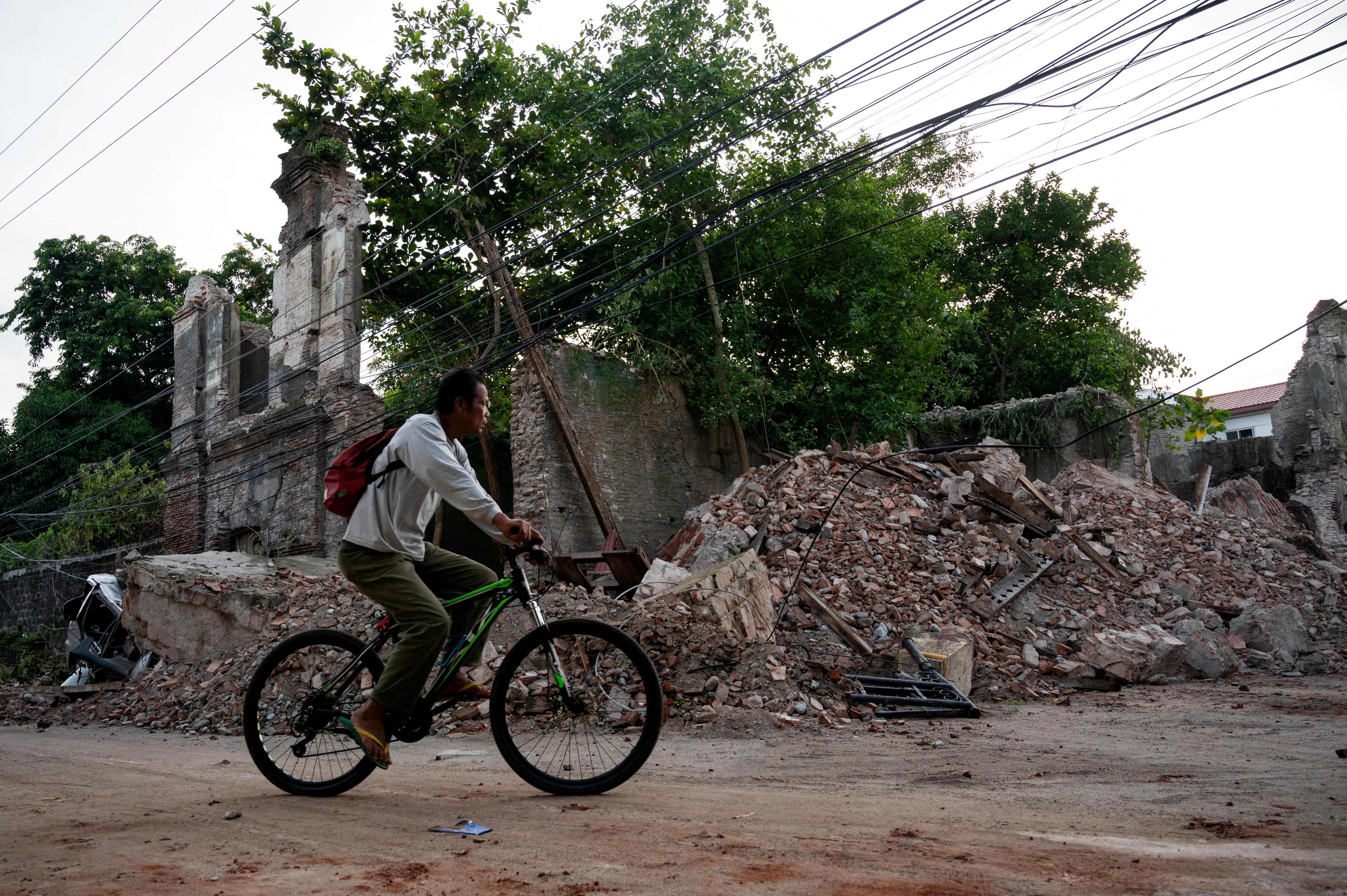 Residents of Abra province in the Philippines sleep outside in fear of ...