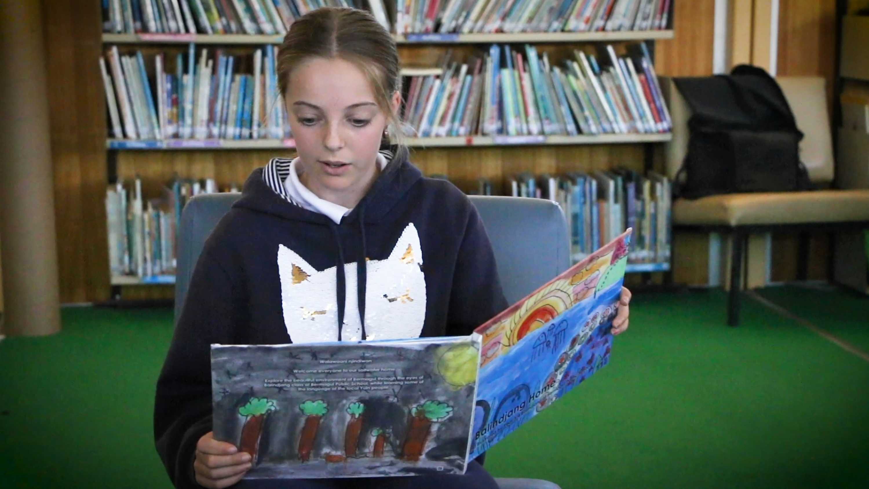 Bermagui Public School students read Our Balindjang Home. - ABC News