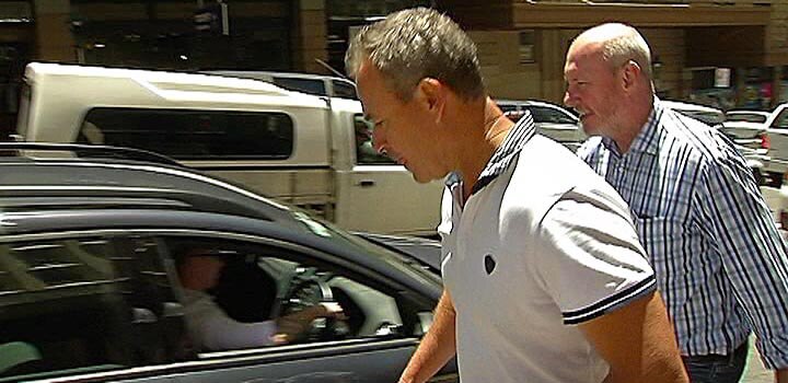 Charges dropped against Clive Palmer's media advisor, ex-cop and former ...