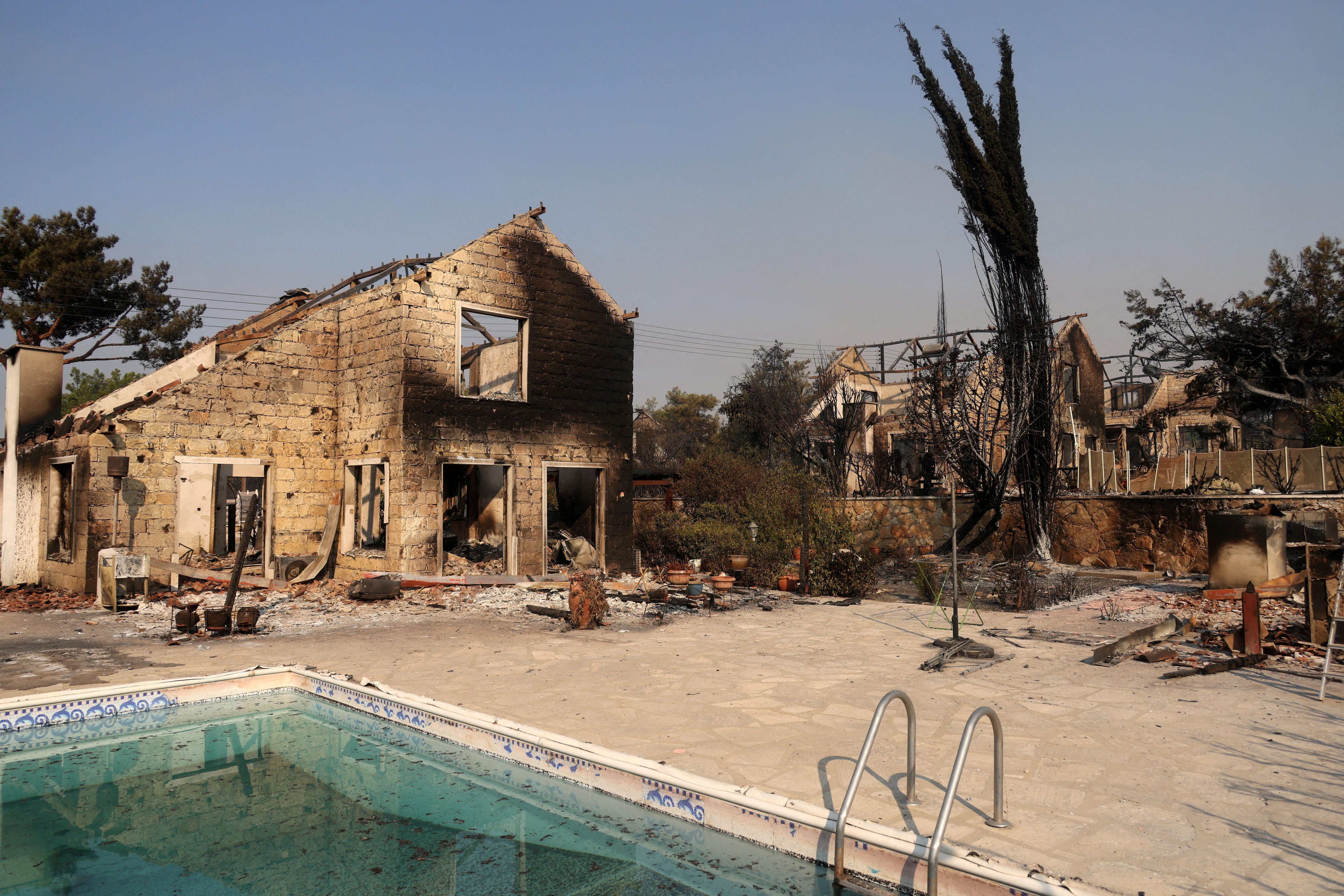 Two found dead in car as Cyprus wildfire rages on - ABC News