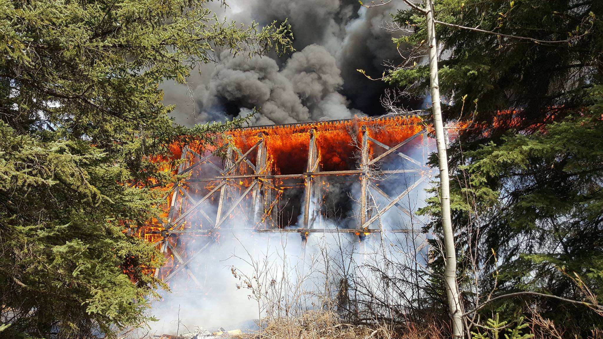 Canadian wooden trestle bridge destroyed in spectacular fire in Alberta ...