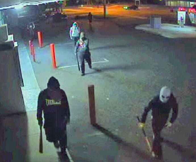 Police search for baseball bat gang after attack - ABC News