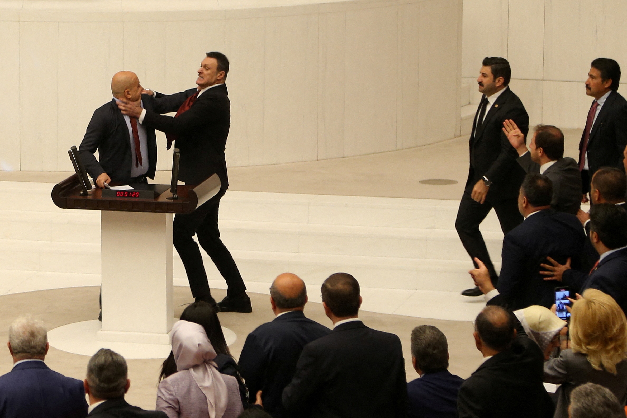 Blood shed on floor of Turkish parliament as government and opposition ...