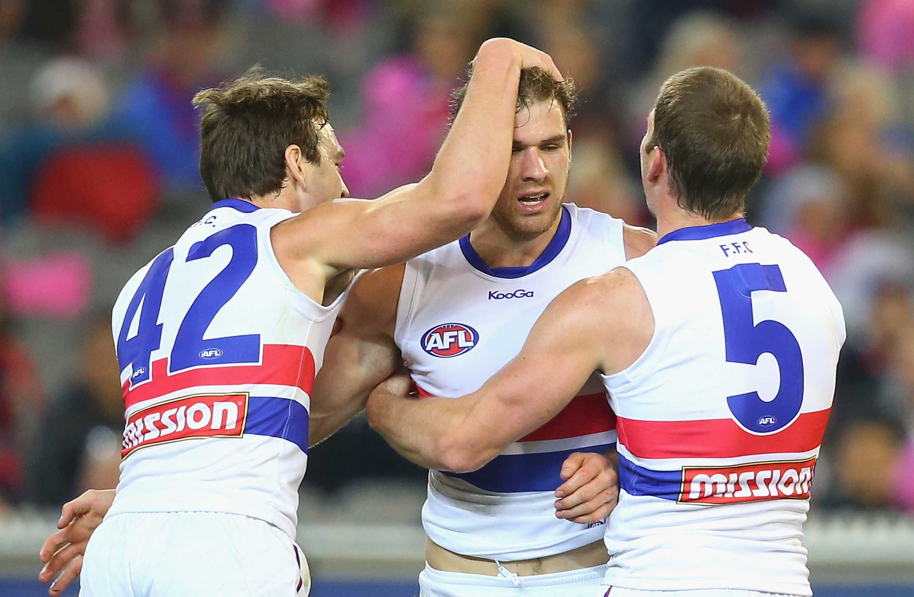 Western Bulldogs outlasts Melbourne to win by 16 points at the MCG ...