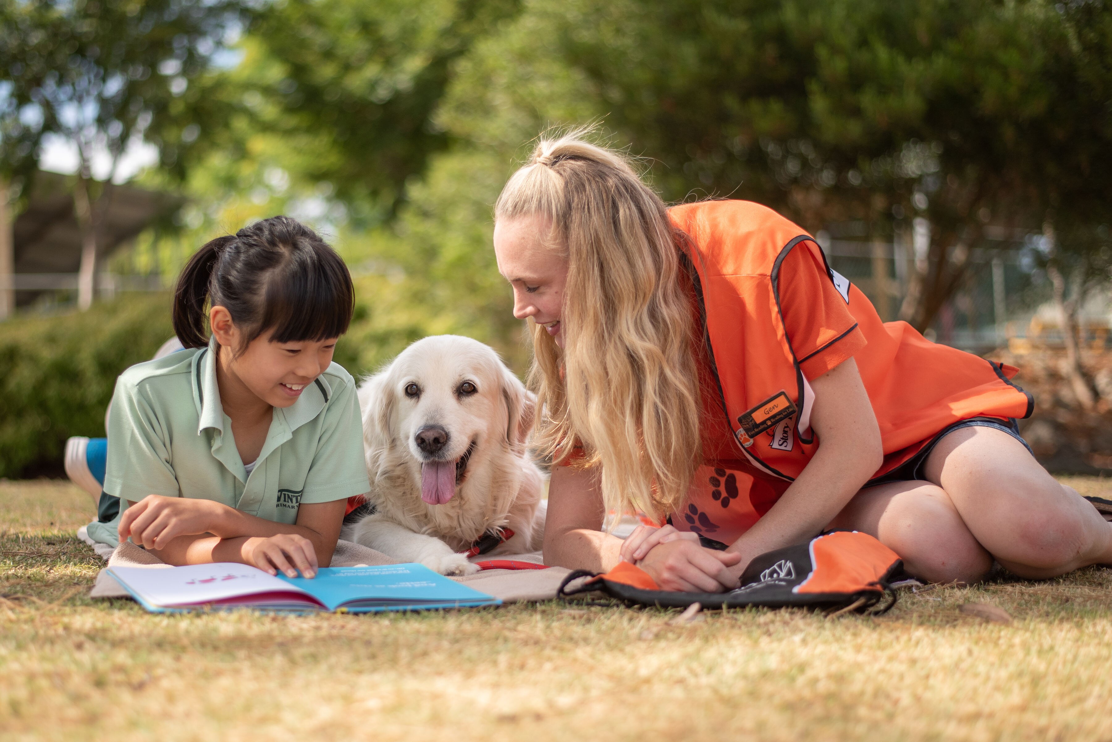 Story Dogs reading program provides positive, calm…